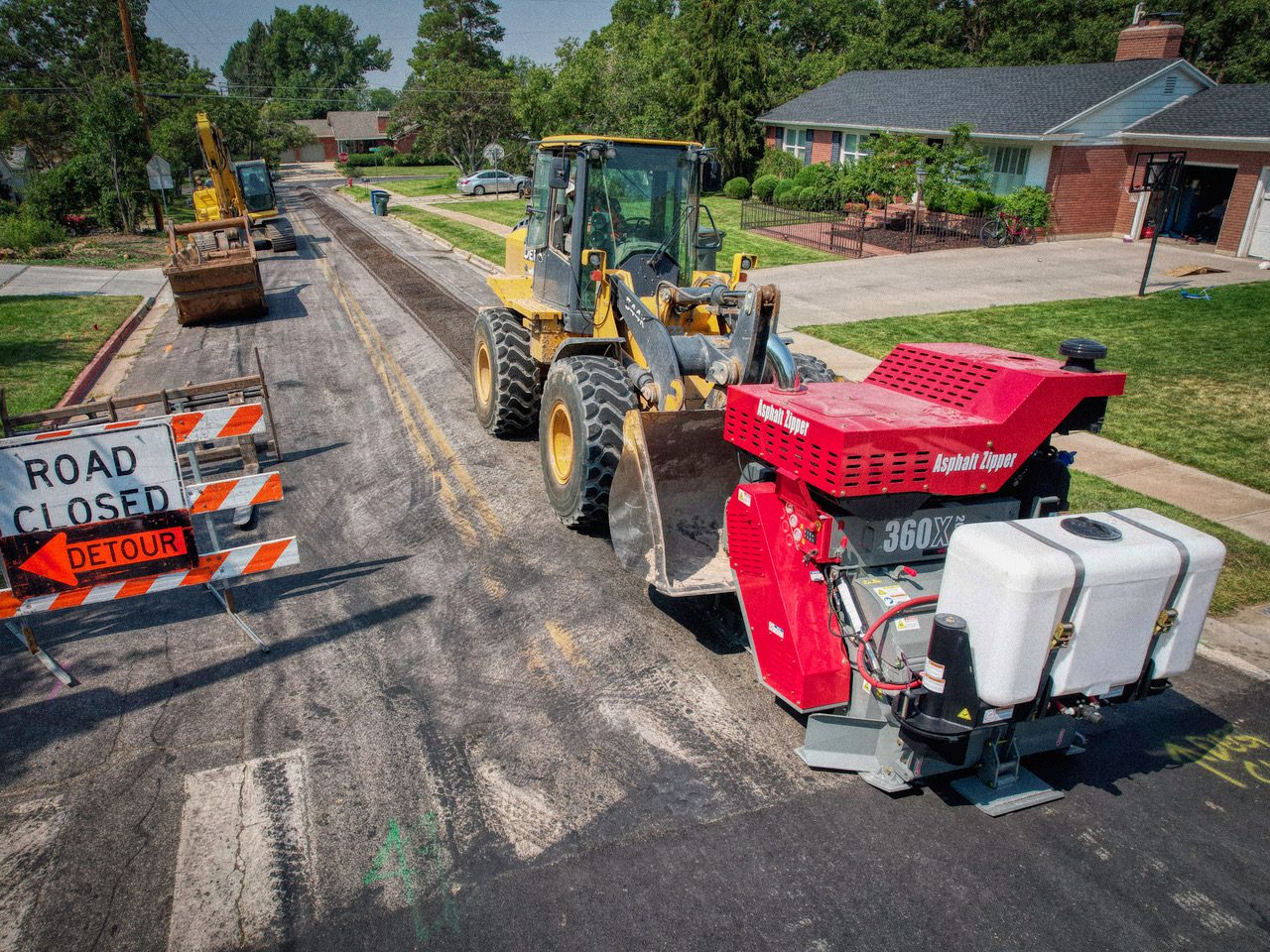Asphalt Grinding Machine vs. Saw Cutting for Utility Work | Government ...